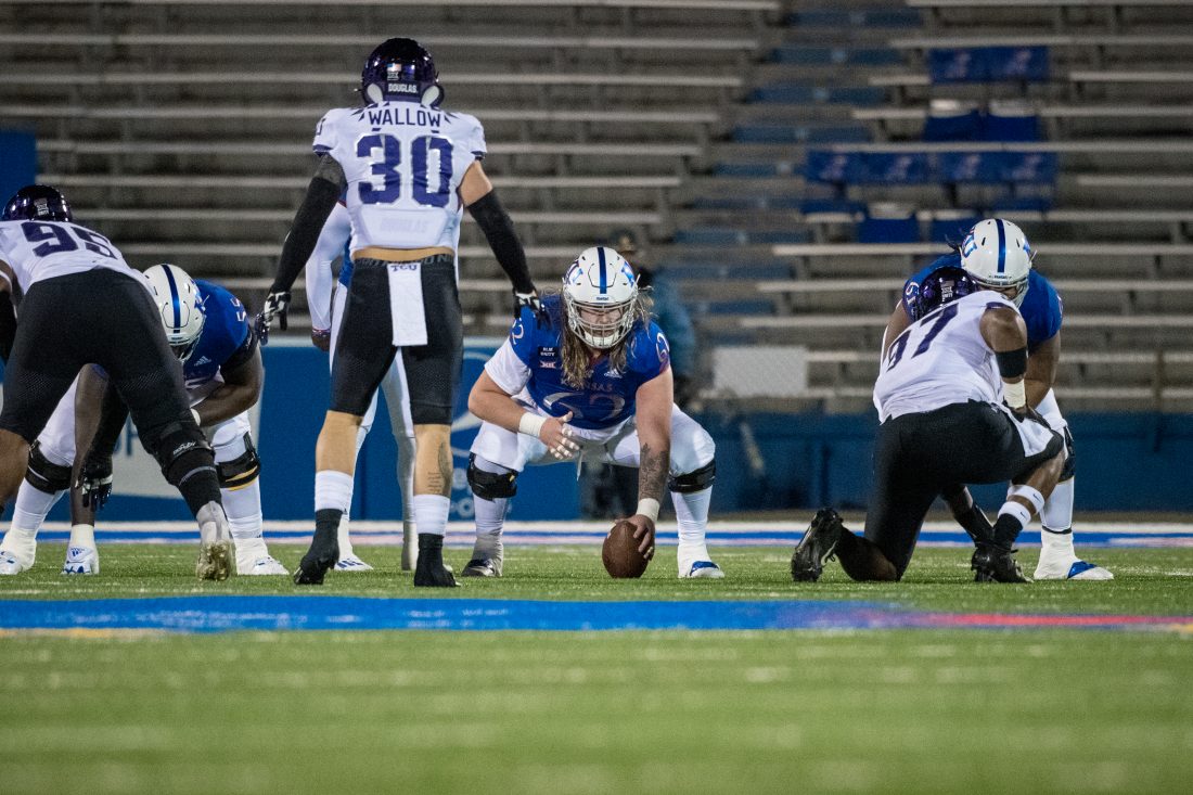 Jayhawks assess pros, cons of starting 3 true freshmen on O-line | News ...